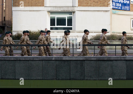 Soldiers in the British Army marching with their Rifles in a welcome ...