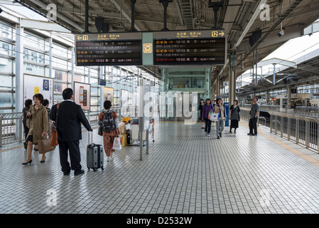 Shin Osaka station in Japan. A 700 series Shinkansen, bullet train, in ...