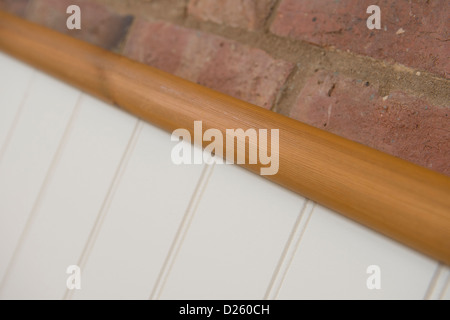Pine baton on top of painted tongue and groove panelling in a newly ...