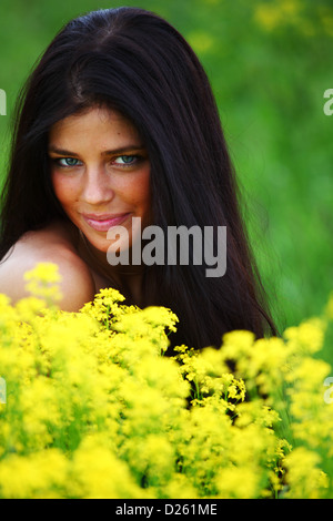 woman on oilseed field close portrait Stock Photo - Alamy