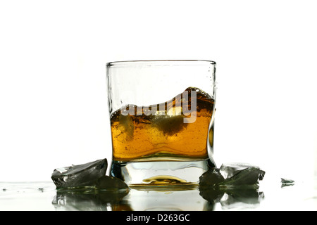 whisky splash alcohol drops isolated on white Stock Photo - Alamy