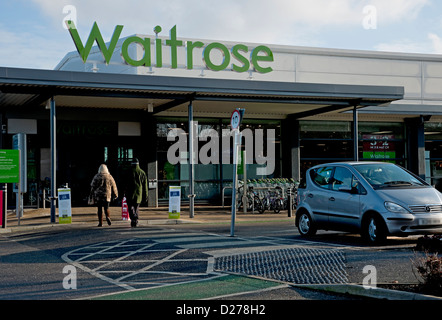 Sign at the entrance to a Waitrose supermarket car park listing store ...