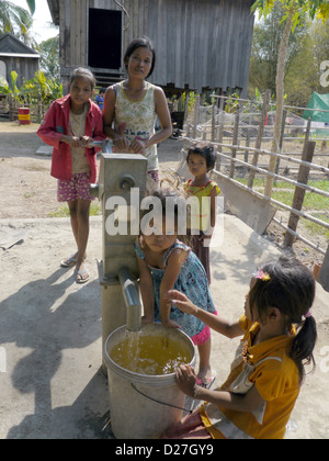 Cambodia - children washing at well Stock Photo - Alamy