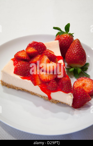 Cheesecake with strawberry on a plate Stock Photo - Alamy