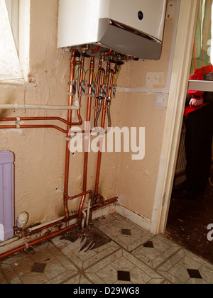 Heating boiler with pipes installed in residential house Stock Photo ...