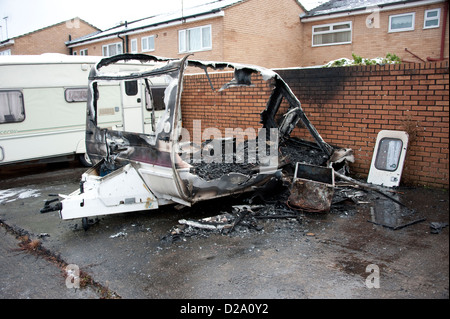 Burnt out caravan Stock Photo - Alamy