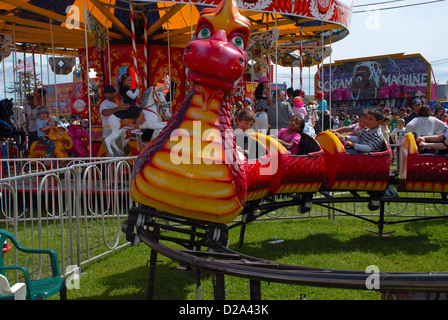 Dragon merry go round Stock Photo - Alamy