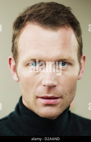 Close up of mans serious face Stock Photo - Alamy