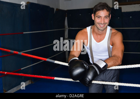Smiling boxer standing in ring Stock Photo - Alamy