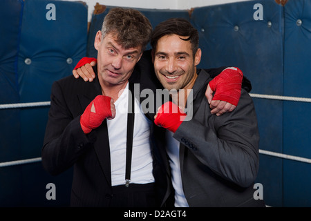 Two boxers hugging in the ring after a club fight. Sportsmanship ...