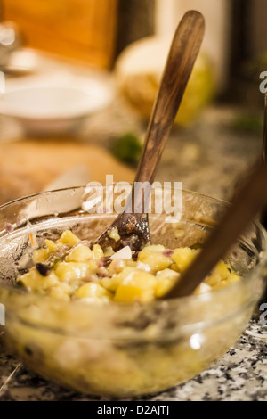 Bowl with delicious potato salad on table Stock Photo - Alamy