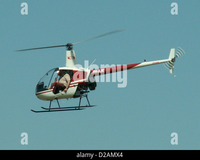The R22 is a light two-seat helicopter with a distinctive design, used ...