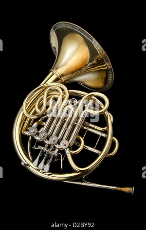 French horn, wind instrument. On a black background Stock Photo - Alamy
