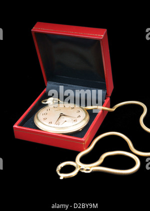 Mechanical pocket watch on a red envelope Stock Photo - Alamy
