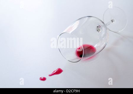 Knocked over glass and split wine Stock Photo - Alamy