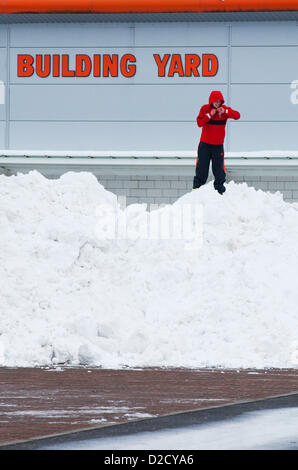 Children play with snow after the cold wave attack in Harbin City ...