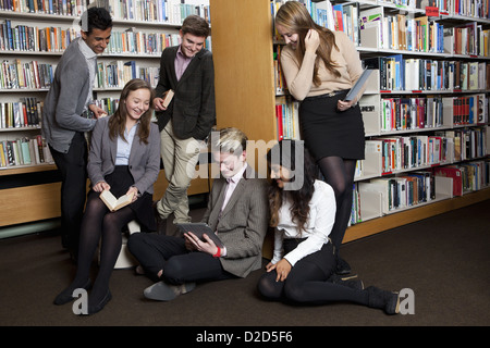Girls in school uniform reading together, Meyerton Primary School Stock ...