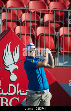 golf player finishing swing Stock Photo - Alamy
