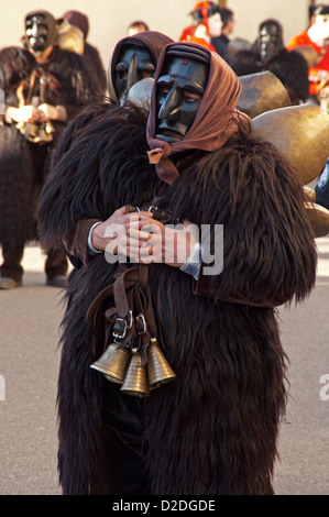 Mamuthones masks on the street at the Mamoiada traditional Carnival ...