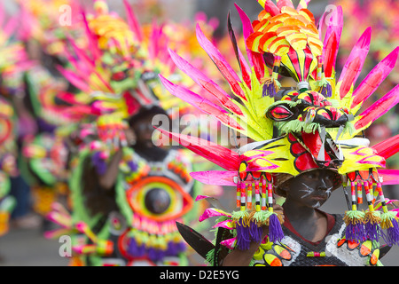 Street dance participant wearing colourful headdress,Ati-Atihan ...