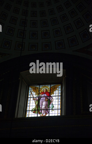 Archangel Raphael in the stained glass East window designed by Eric ...