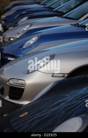 Porsche cars line up outside a car dealers Stock Photo - Alamy