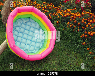 Small empty colorful inflatable plastic swimming pool for kids Stock ...