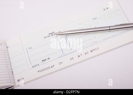 Blank check book with pen isolated on a white background Stock Photo ...