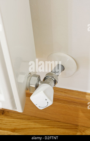 Temperature knob of heating radiator, used and dusty Stock Photo - Alamy