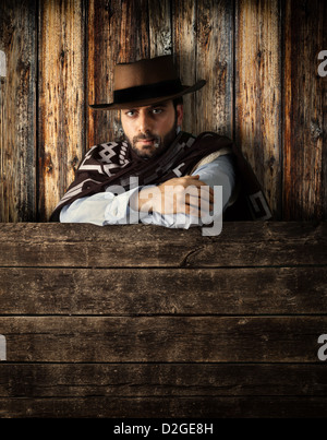Bad gunslinger in the old wild west. Western concept Stock Photo - Alamy