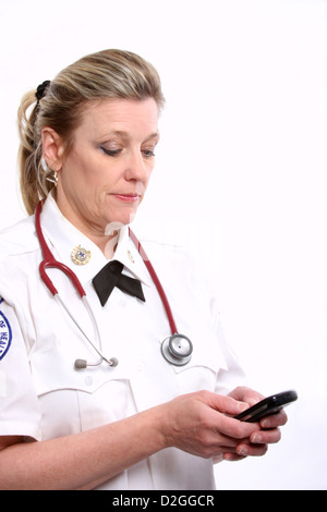 A Wisconsin EMT on a cell phone Stock Photo - Alamy