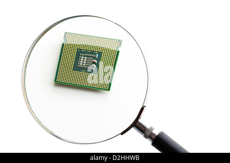 Cpu processor through a magnifying glass Stock Photo - Alamy