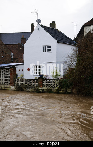 Houses under threat from flood water from Cod Beck, Thirsk Stock Photo ...