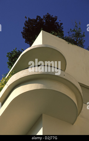 Protruding streamline balcony and a thin curved concrete shade of an ...