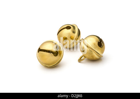 Shiny golden sleigh bells on white background Stock Photo - Alamy