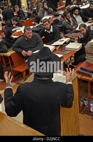 4 religious Jewish students studying Talmud at Lubavitch headquarters ...