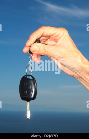woman hand dangling a car key Stock Photo - Alamy