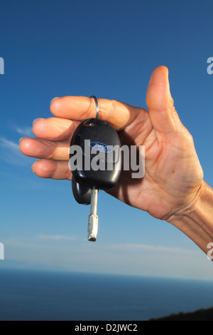 woman hand dangling a car key Stock Photo - Alamy