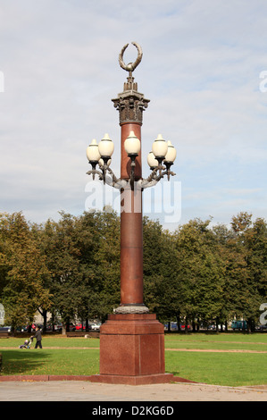 Old Style Lamp Post Globes City Lights Power On Stock Photo - Alamy