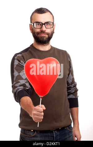 Young handsome man with a beard is holding red shopping bags posing on ...
