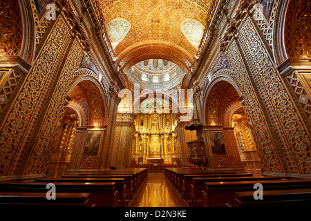interior shot of brilliantly golden designed Compania de jesus church ...