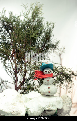 snowman made in plasticine in winter scene Stock Photo - Alamy