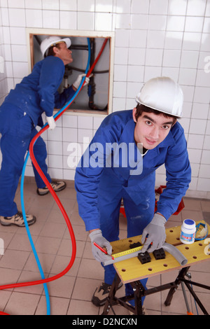 "trainee apprentice pipe fitter plumber learning how to bend a mild ...