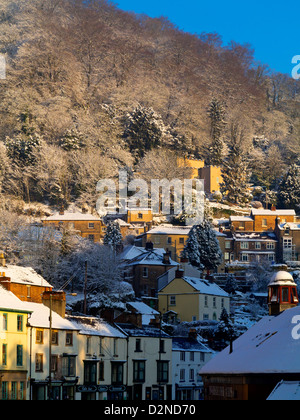 Snow covered houses and shops in Matlock Bath a popular village in the ...