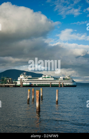 Landscape of a dock on the Puget Sound during a beautiful sunset in ...