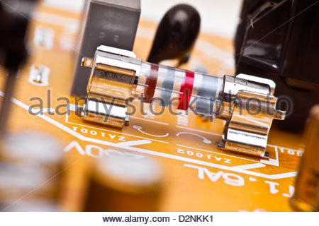 Fuse mounted on circuit board to protect electronic components from ...