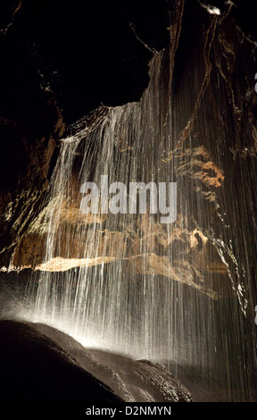 Underground waterfall, in a cave, giving abstract image of the stream ...