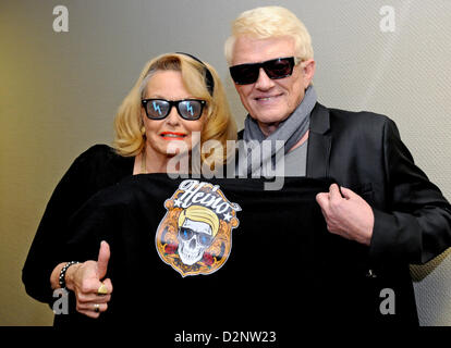 German folk singer Heino (L) and his wife Hannelore clink glasses in ...