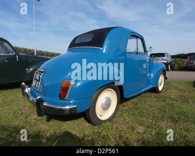 The 1952 Fiat 500C is a classic compact car from Italy, known for its ...
