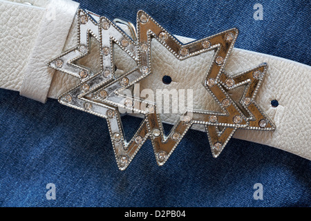 White belt with sparkling stars buckle set on white background Stock ...